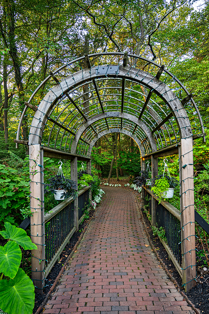 Walking through this brick-paved arbor feels like entering a secret garden tunnel that might just lead to Narnia&mdash;or at least away from your emails.