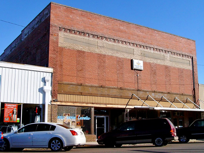 Brick storefronts with character to spare line downtown, their weathered facades telling stories of boom times and quiet years.