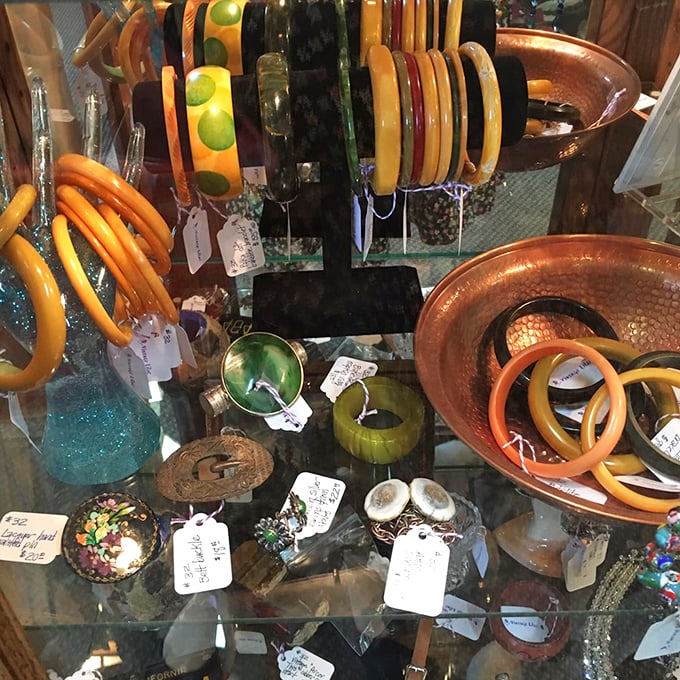 Bakelite bangles and copper treasures—jewelry that doesn't just accessorize an outfit but time-travels it back to an era of cocktail parties and swing music.