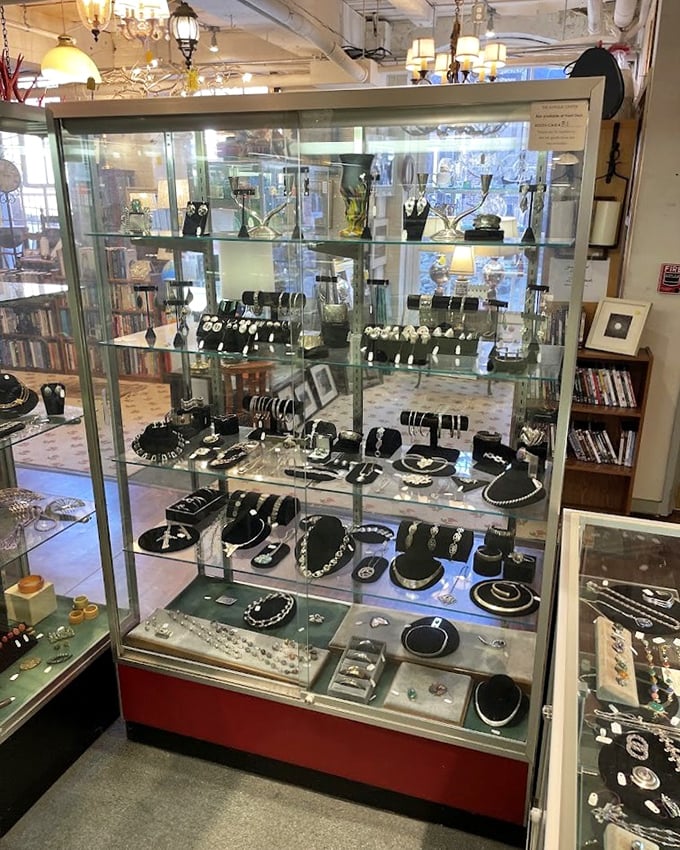 Jewelry displays that would make Elizabeth Taylor pause mid-shopping spree. Each glass shelf holds potential heirlooms waiting for their next chapter.