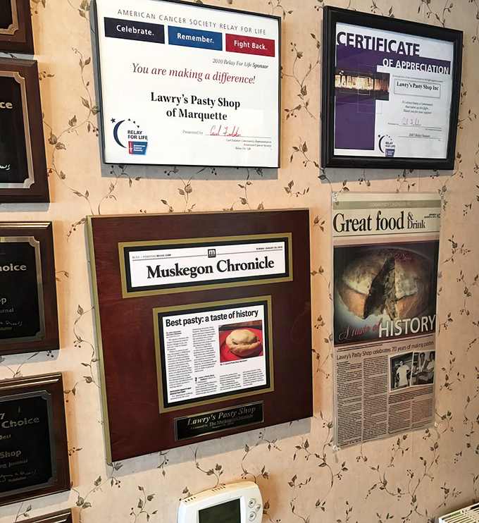 A wall of accolades that speaks volumes—when newspapers and the American Cancer Society both love you, you're doing something right.