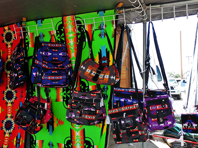 Bags bursting with color against vibrant textile backdrops. Who needs designer labels when you can carry a piece of New Mexican artistry on your shoulder?