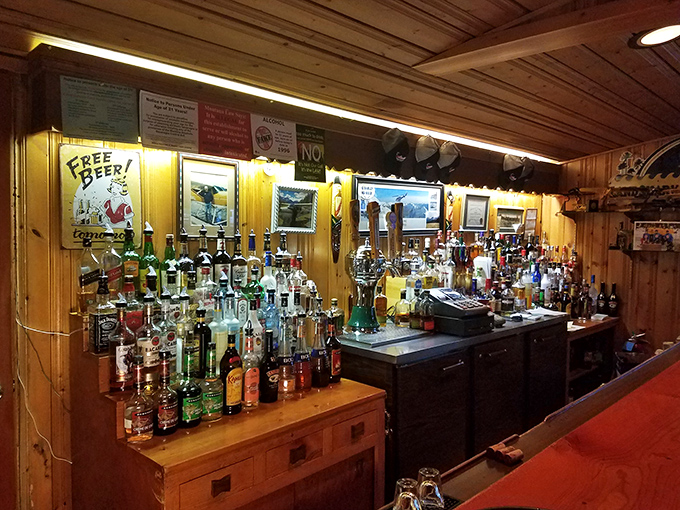 A bar stocked for celebration or contemplation. Whatever your spirit preference, it's waiting beneath the warm glow of Montana memorabilia.