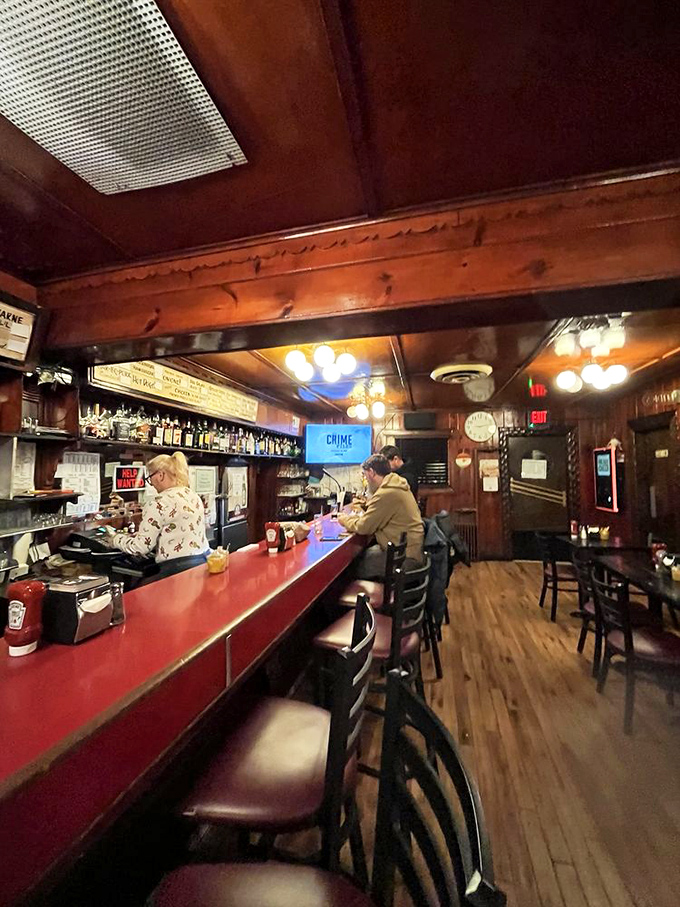 The bar where strangers become friends and friends become family, all united by the universal language of good food and cold drinks.