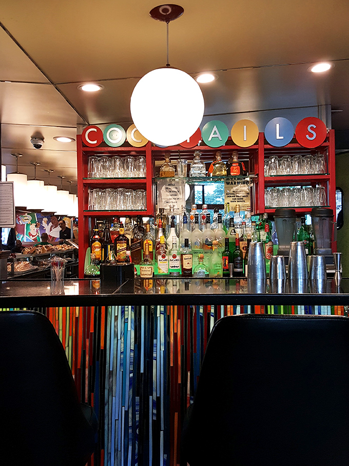 The bar area doesn't just serve drinks&mdash;it serves possibilities, all lined up in colorful bottles waiting for their moment.