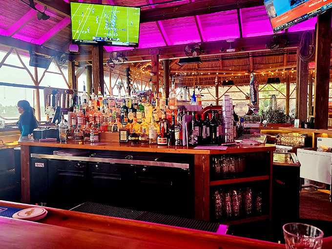 The bar glows with promise and possibility—like a beacon of tropical cocktails calling you away from ordinary beverages.