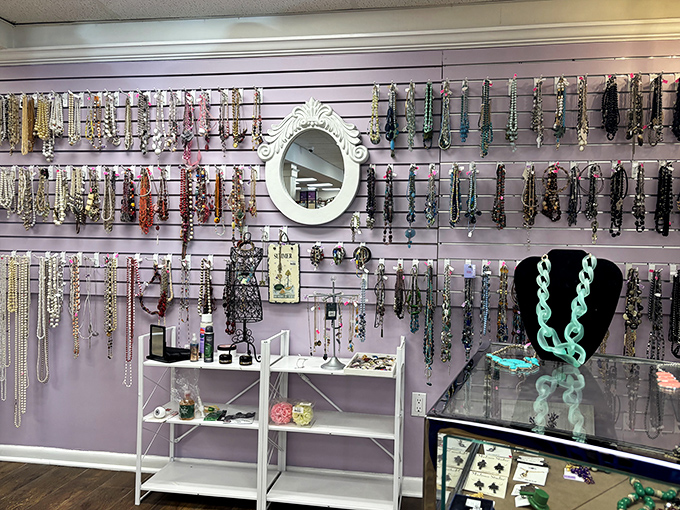 Jewelry display that would make a treasure chest jealous. Each necklace tells a story &ndash; some glamorous, some quirky, all waiting for their next chapter.