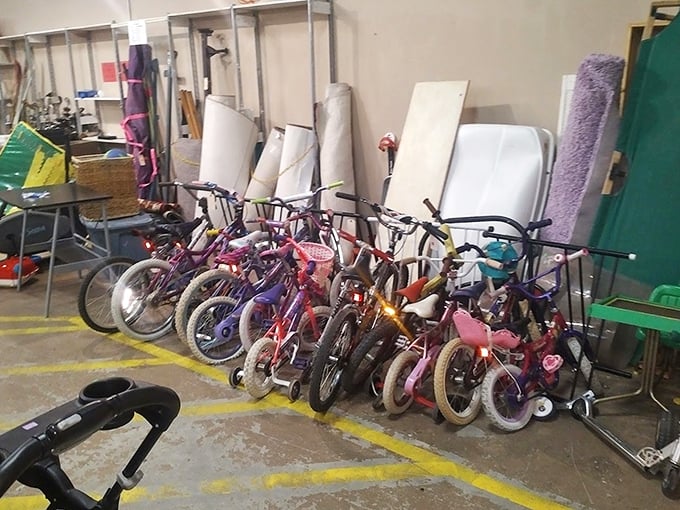 The bicycle graveyard&mdash;where kids' outgrown wheels and abandoned exercise intentions gather dust before finding their next adventure partner.