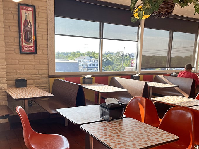Window seats offer views of Collegeville life passing by, while vintage Coca-Cola art reminds you some things never need changing.