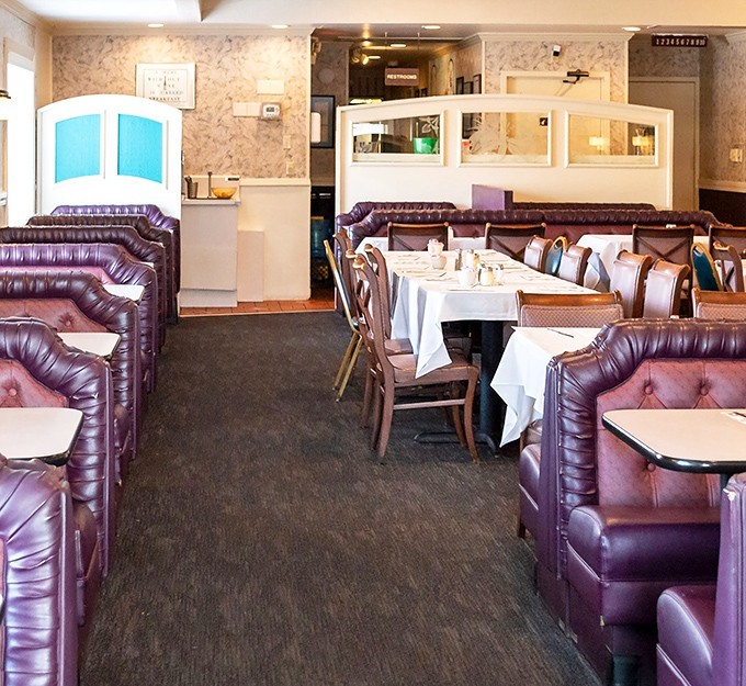 These booths have cradled the posteriors of generations of Columbus diners, offering the perfect blend of comfort and privacy.