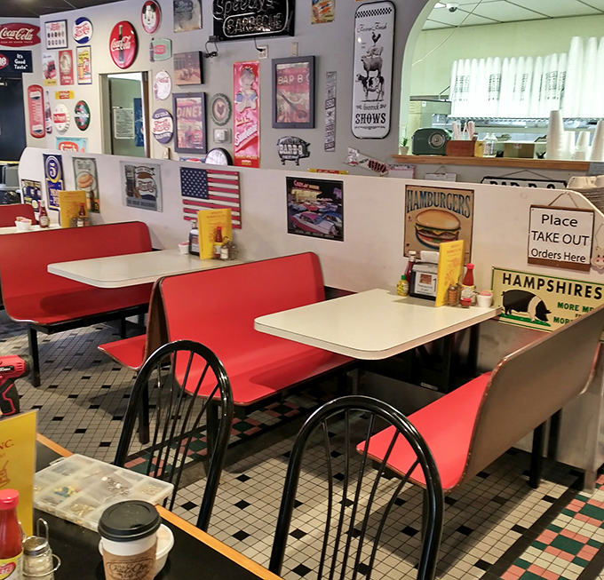 Red booths invite you to settle in for serious eating, while vintage signs remind you that you're participating in a time-honored American tradition.