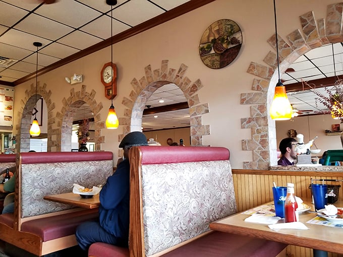 Cozy booths separated by wood paneling &ndash; the dining equivalent of a warm hug. Privacy for intimate conversations or serious eating focus.