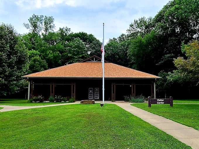 The visitor center welcomes explorers with rustic charm, serving as basecamp for adventures into one of Illinois' last old-growth forests.