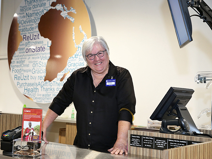 The friendly face of Re-Uzit welcomes shoppers to bargain paradise. Like the maitre d' at your favorite restaurant, she's the gateway to all good things within.