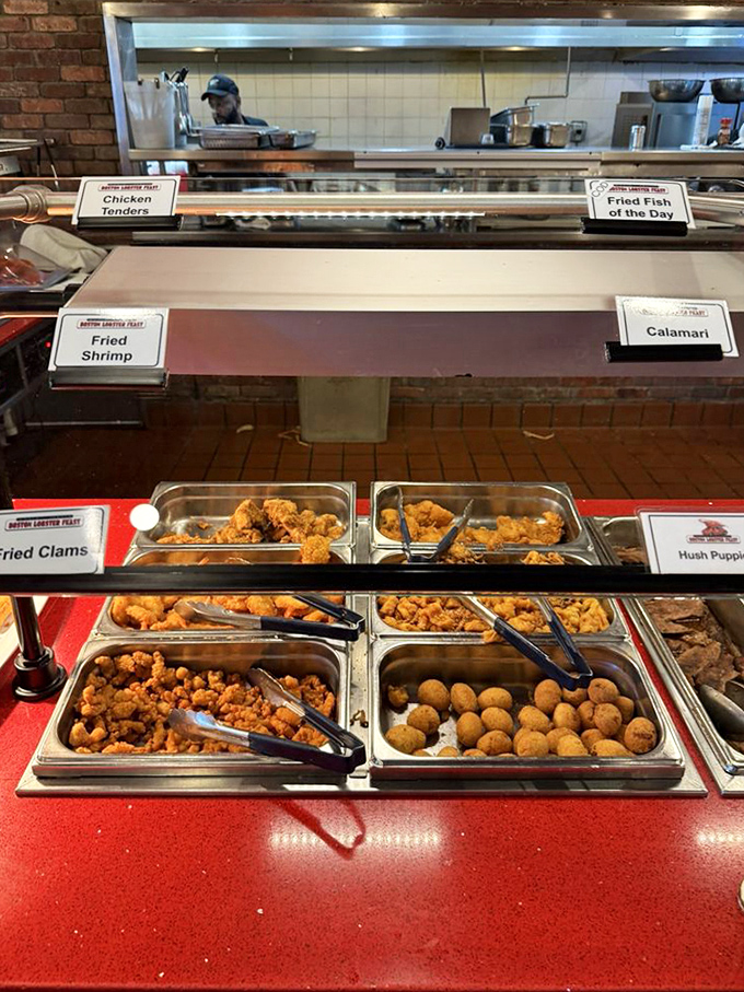 The buffet's fried seafood station showcases golden-battered delights&mdash;where calories don't count and crunch is king.