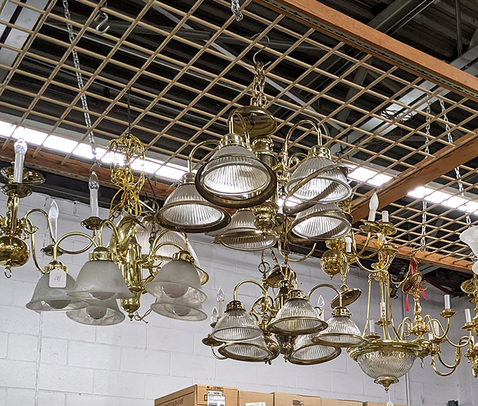Chandeliers hanging like golden jewelry for your ceiling&mdash;proof that lighting fixtures can be both functional and statement-making without breaking the bank.