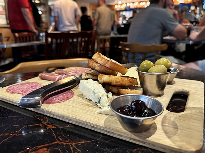 This charcuterie board isn't just appetizers – it's a meaty prelude that warns your main course it has serious competition.