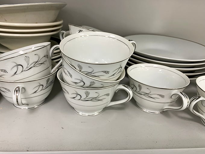 Delicate teacups with silver trim that whisper, "Yes, you ARE fancy enough to drink from me." Pinky up!