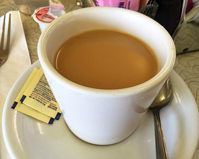 The coffee comes with a guarantee right on the sign outside. This honest cup has launched a thousand Atlanta mornings.