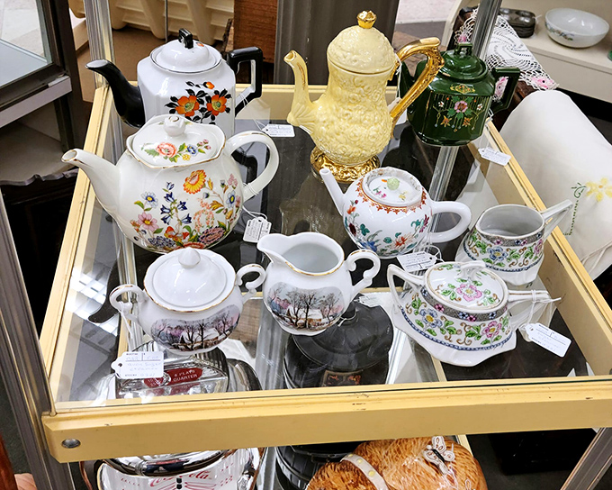 Teapots that have poured for countless conversations stand ready for their next social gathering, each one a portal to more civilized times.