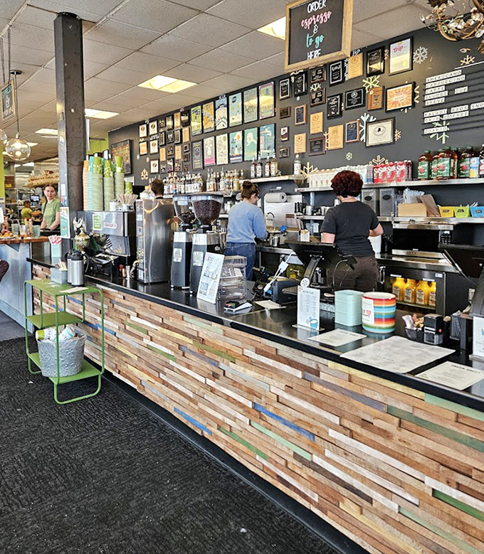 Behind this counter, breakfast wizards transform simple ingredients into morning masterpieces. The wall of awards speaks volumes.