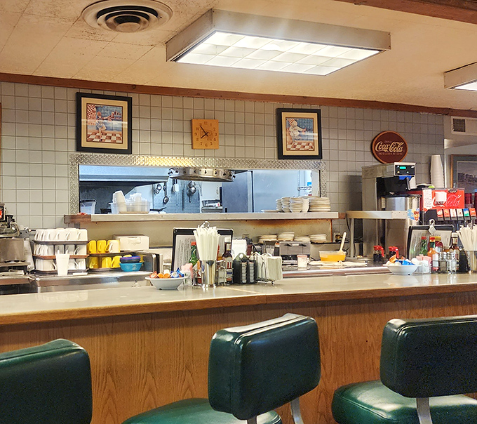 Counter seating &ndash; the choice of diner connoisseurs who know the best conversations happen within earshot of the grill's sizzle and the coffee maker's gurgle.