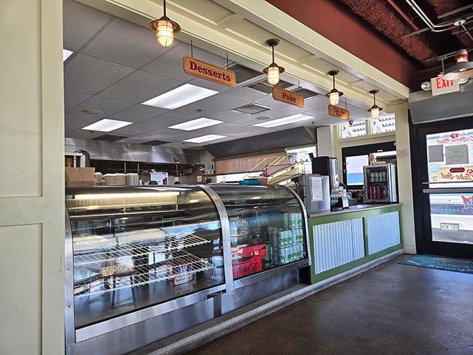 The dessert counter promises sweet endings to savory beginnings, with displays that make willpower completely irrelevant.