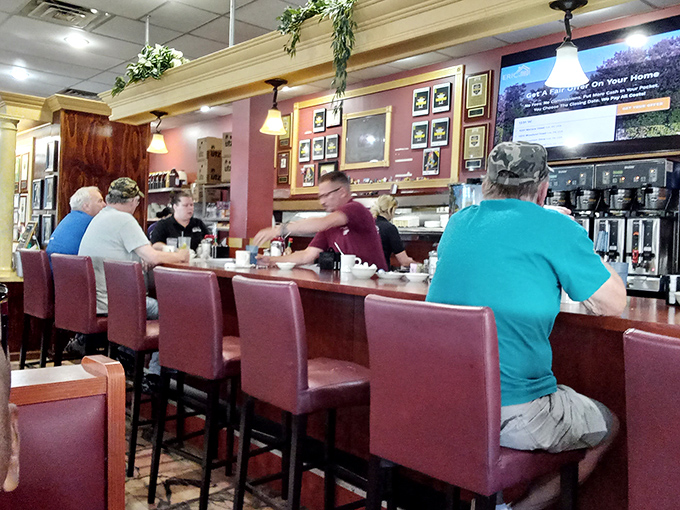 The counter &ndash; where solo diners find community, regulars hold court, and the rhythm of diner life plays out like a well-rehearsed symphony.
