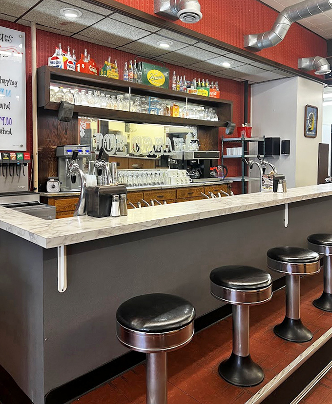 Chrome stools, marble counter, original fixtures&mdash;this is where milkshakes became social events, not drive-through afterthoughts.