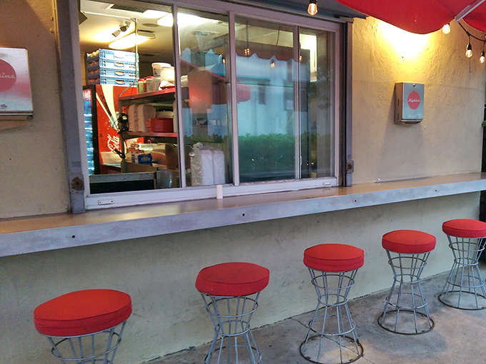Counter seating for the serious eaters who can't wait for a table. Red stools that have witnessed countless first bites and food epiphanies.