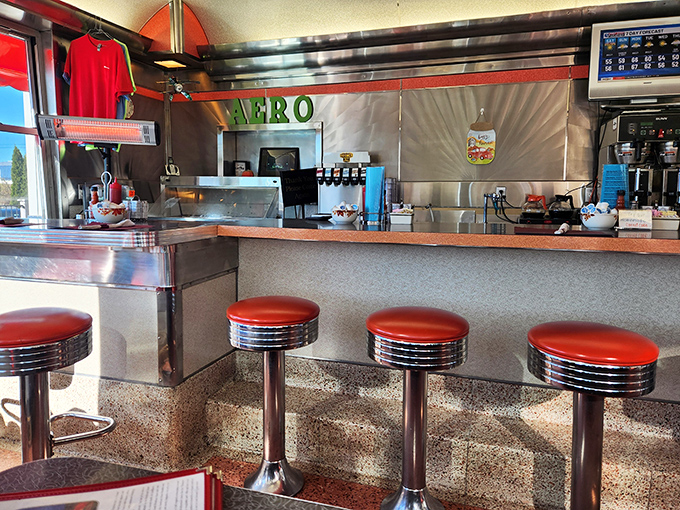 The counter &ndash; where solo diners become part of the Aero family, watching short-order magic happen one sizzling griddle at a time.