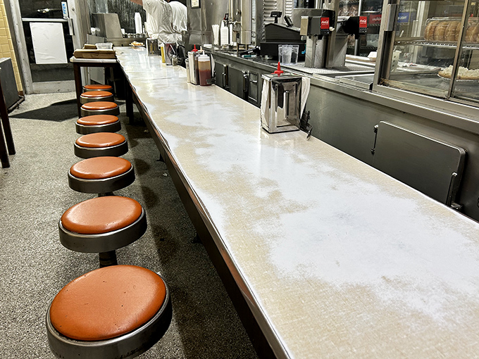 The counter where magic happens &ndash; these orange stools have supported generations of Detroiters seeking comfort food bliss.