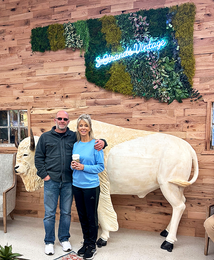 Fellow treasure hunters lost in the joy of discovery, their shopping carts silently judging their self-control failures.