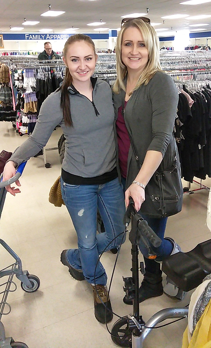 The joy of thrifting is often shared! These shoppers demonstrate the social side of secondhand treasure hunting&mdash;a bonding experience over unexpected finds.