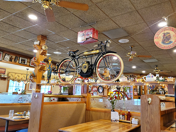 Look up and you'll spot a vintage motorcycle suspended from the ceiling&mdash;because why not add a dash of quirky to your comfort food?
