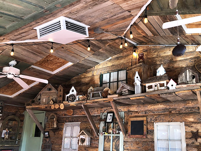 The collection of birdhouses perched above diners adds whimsical charm to the cabin-like interior&mdash;like dining in a treehouse for grown-ups.