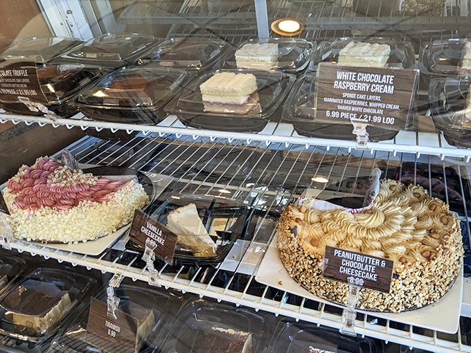 A dessert case that makes willpower crumble faster than the tiramisu&mdash;cheesecakes and layer cakes waiting to turn "I couldn't possibly" into "Yes, please."