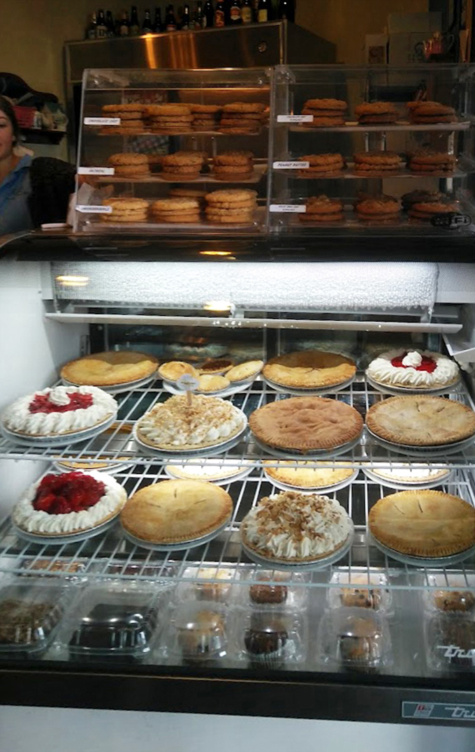 The dessert case &ndash; where willpower goes to die. Pies and cookies arranged like treasures in a museum of sweetness.