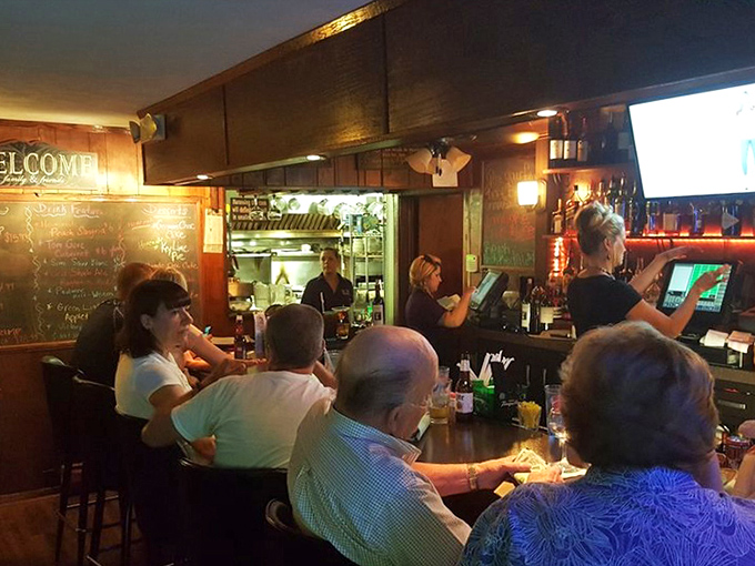 Where locals gather at the bar, sharing stories and secrets while waiting for their perch. Some have probably been sitting in the same spot since the '80s.