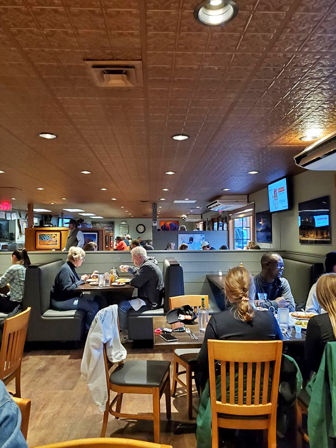 Where locals and visitors break bread together, united by the universal language of "pass the hot sauce, please."