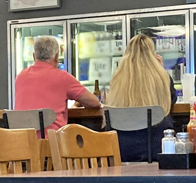 Where locals gather to solve world problems over good food. Some of America's best conversations happen over plates of loaded fries.