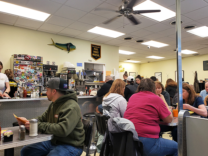 Where strangers become neighbors over coffee refills and shared appreciation for the sizzle of breakfast hitting the griddle.