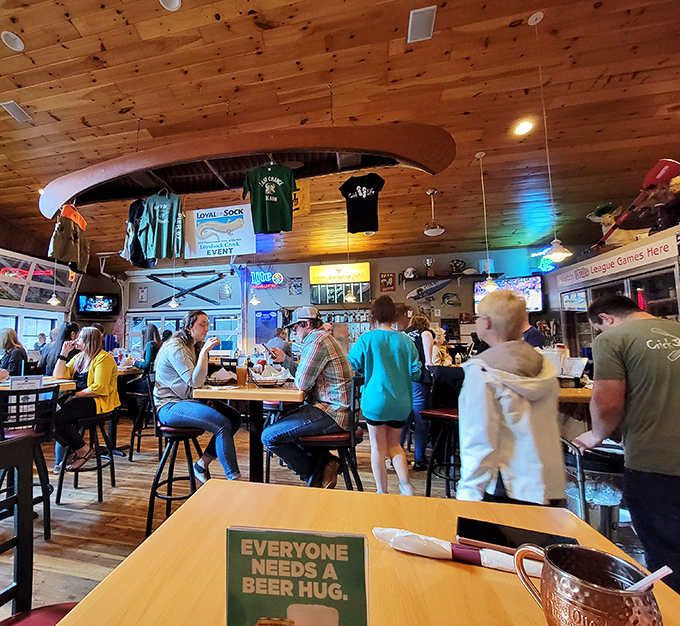 "Everyone needs a beer hug" says the sign, and the lively crowd agrees. This isn't just eating out&mdash;it's Pennsylvania's version of a community living room.