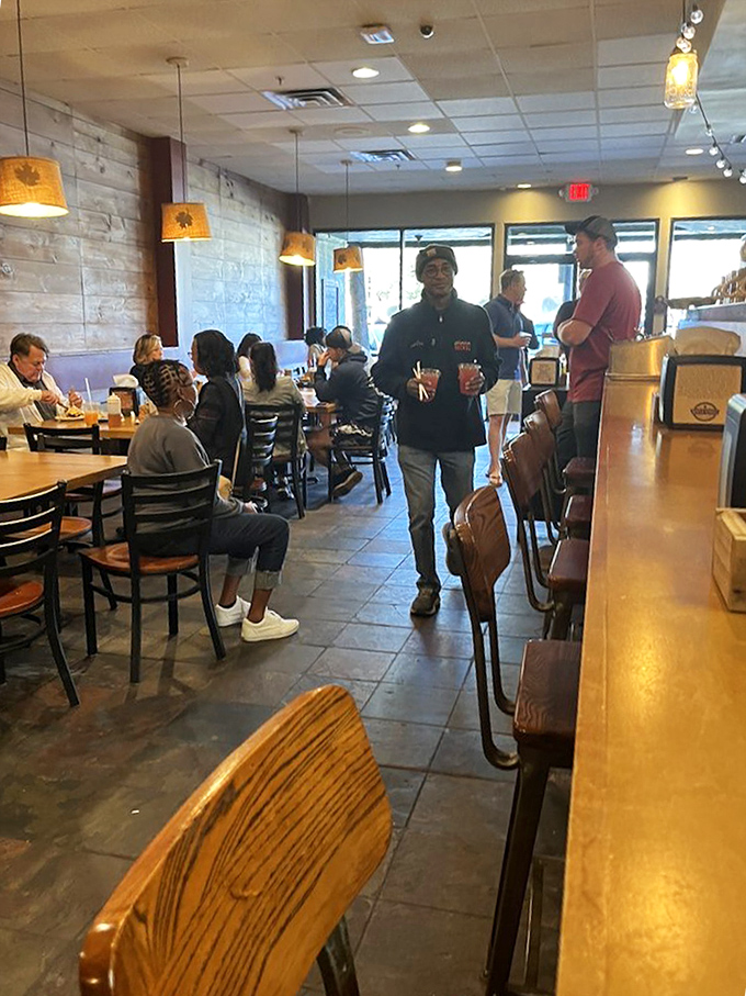 Where strangers become friends over shared biscuit experiences. The bustling dining room hums with the satisfied murmurs of well-fed patrons.