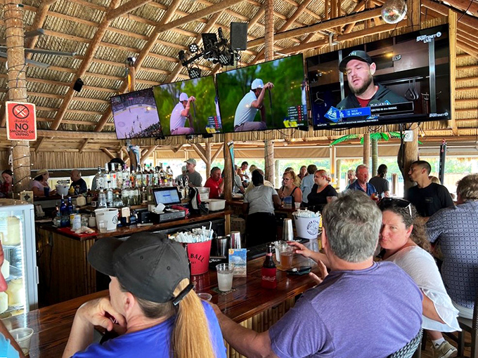 Where locals and tourists become friends. The bustling tiki bar captures that perfect Florida vibe &ndash; casual, welcoming, and always ready for another round.