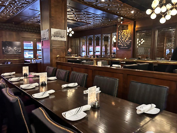 Tables set with anticipation, like blank canvases awaiting the artistry of dinner service. Each white plate a promise of good things to come.