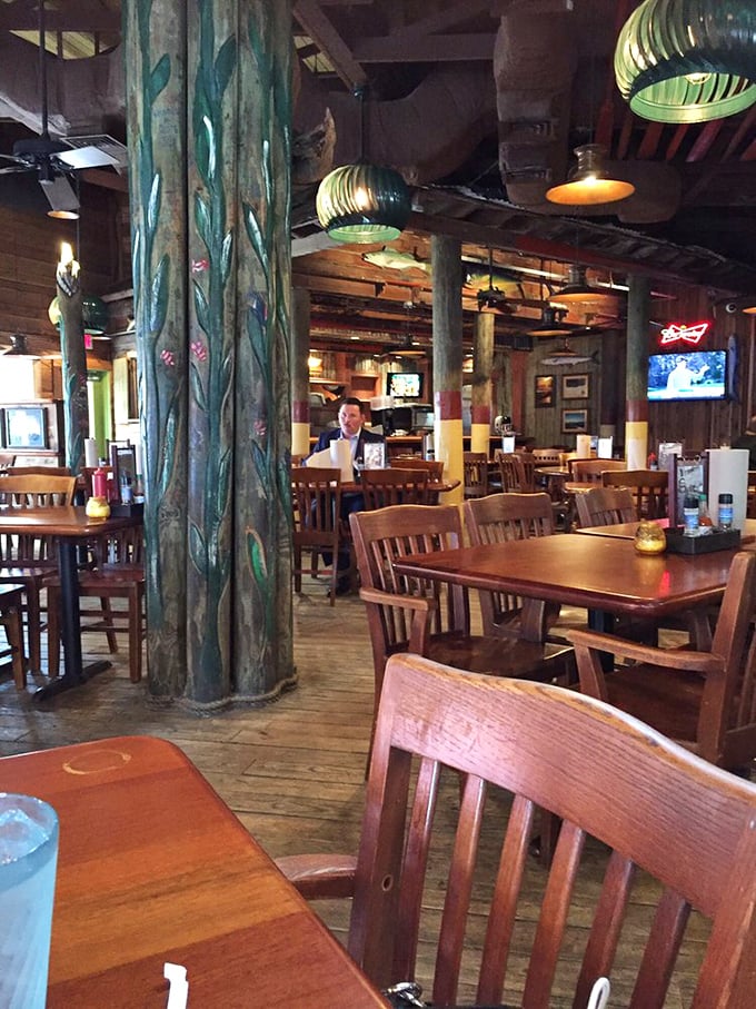 Weathered wood pillars and nautical lighting create the perfect backdrop for seafood indulgence and vacation-mode conversations.