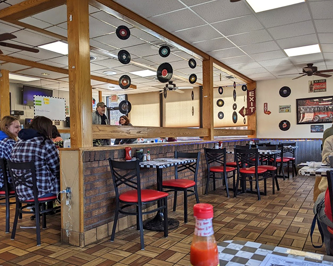 Vinyl records on the ceiling and booth seating that invites you to slow down and actually enjoy breakfast.