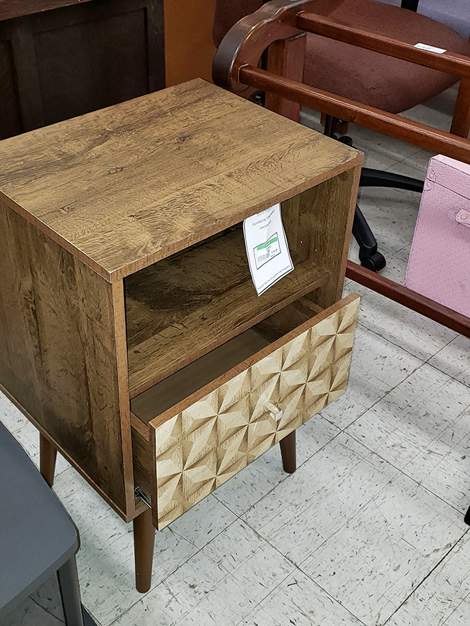 This mid-century inspired nightstand with geometric drawer front is practically begging to display your bedside reading and morning coffee.