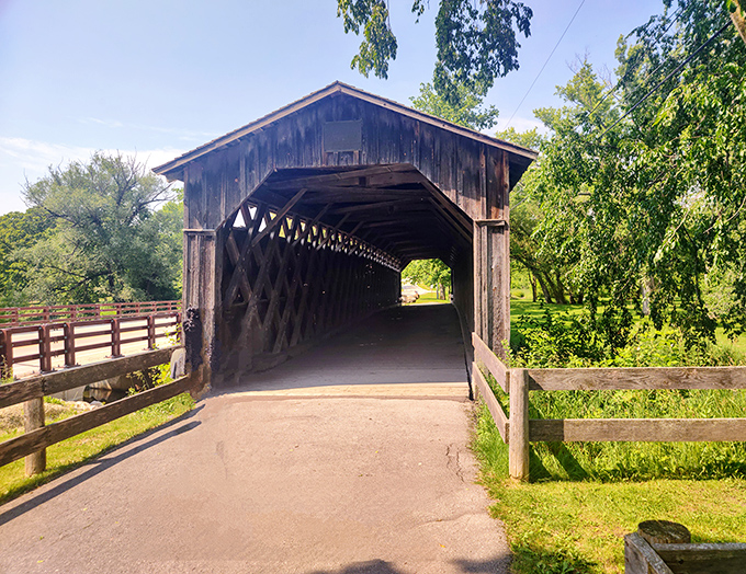 The entrance beckons visitors into its shadowy embrace, promising a brief journey through Wisconsin's architectural heritage.